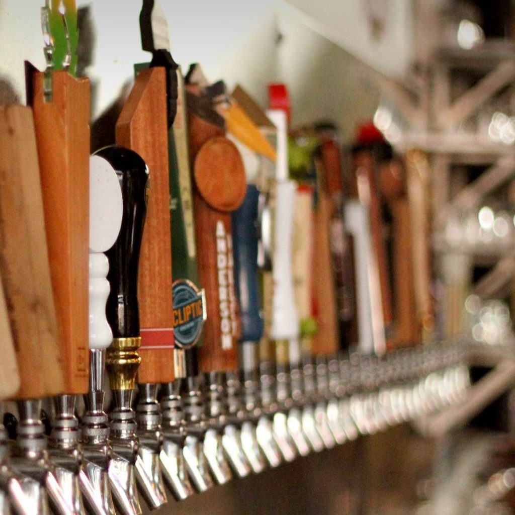 growlerie-tapcanon-square – Pelican Brewing Company